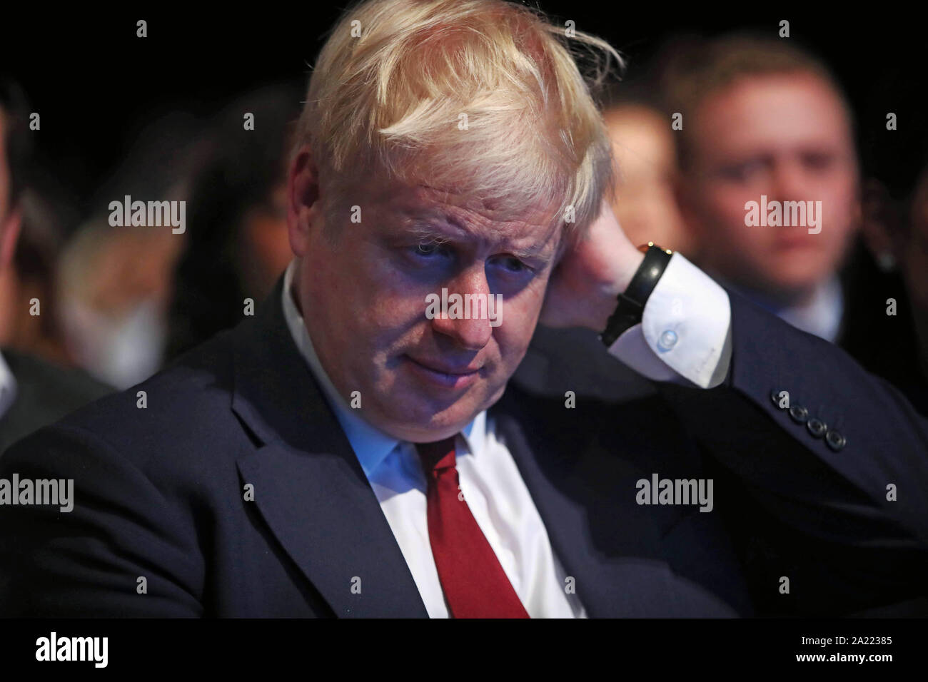 Prime Minister Boris Johnson sits in the audience at the Conservative ...