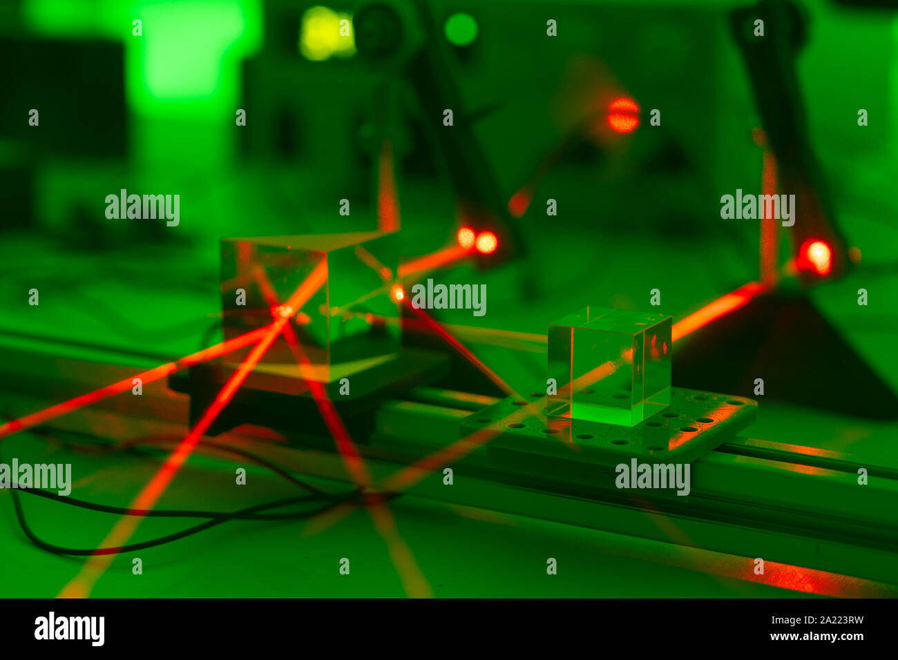 Experiment with a red laser in a physics lab Stock Photo - Alamy