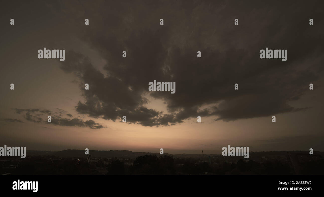 Beautiful sunset sky above clouds with dramatic light Stock Photo - Alamy