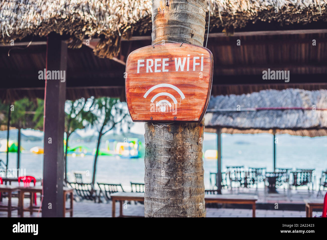 Free WiFi arrow on the beach Stock Photo - Alamy