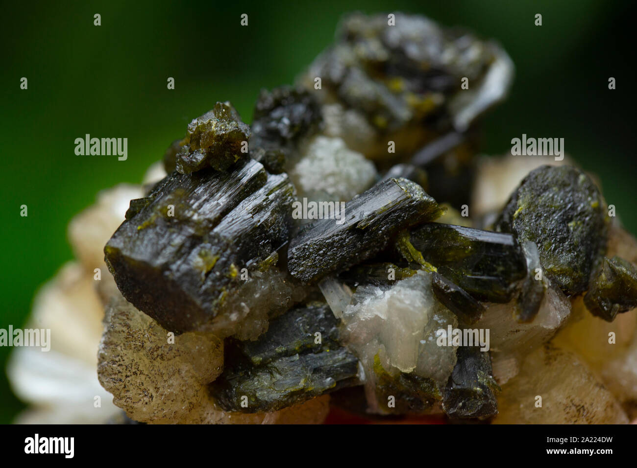 epidote mineral specimen stone rock gem quartz crystal Stock Photo - Alamy