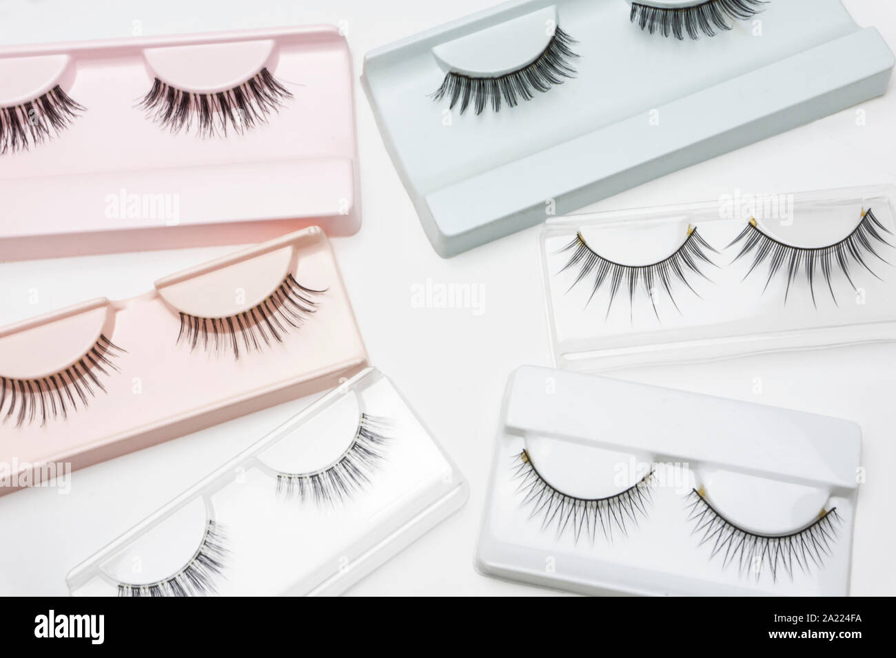 false eye lashes on white background Stock Photo - Alamy