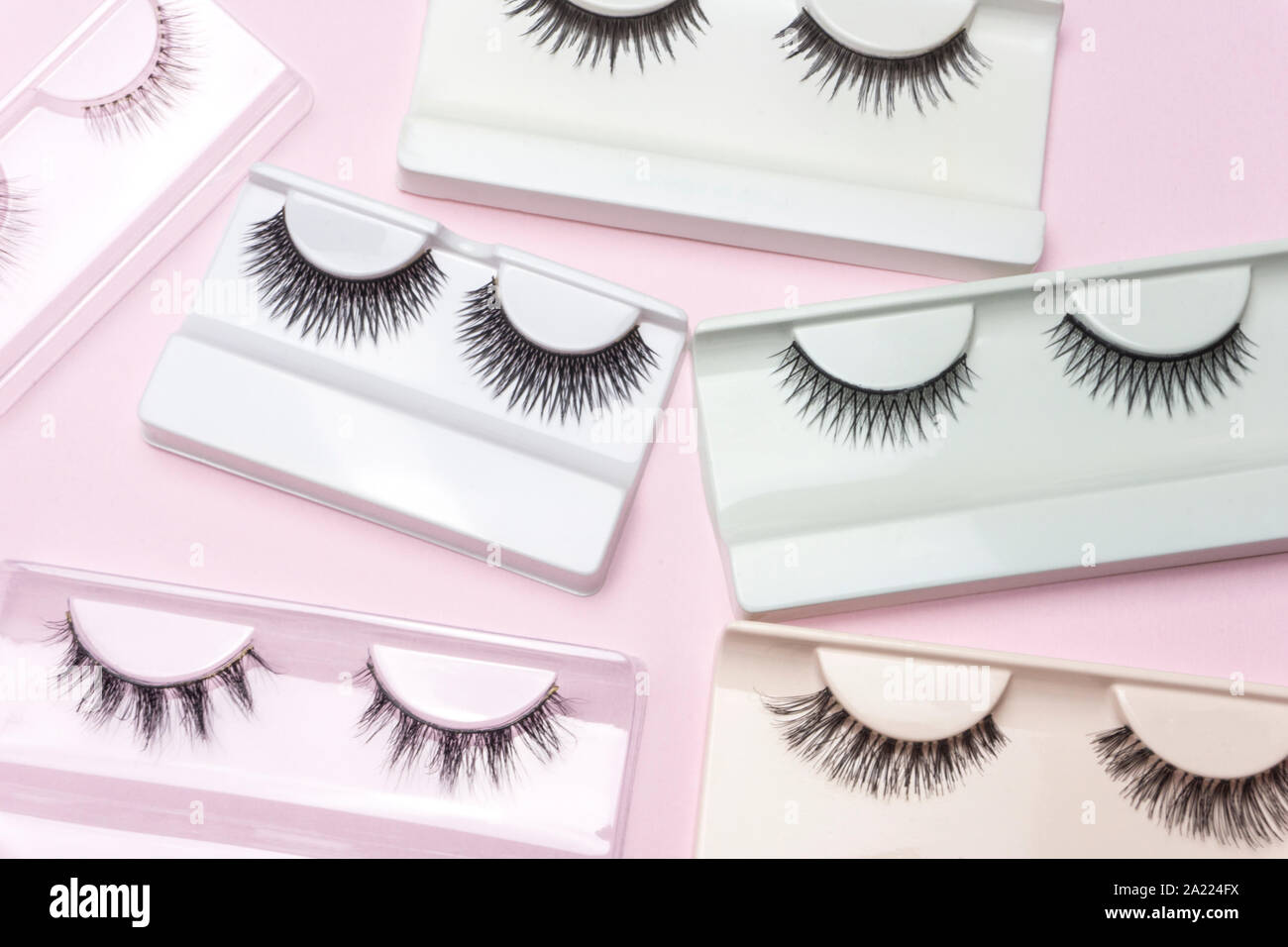 false eye lashes on white background Stock Photo - Alamy