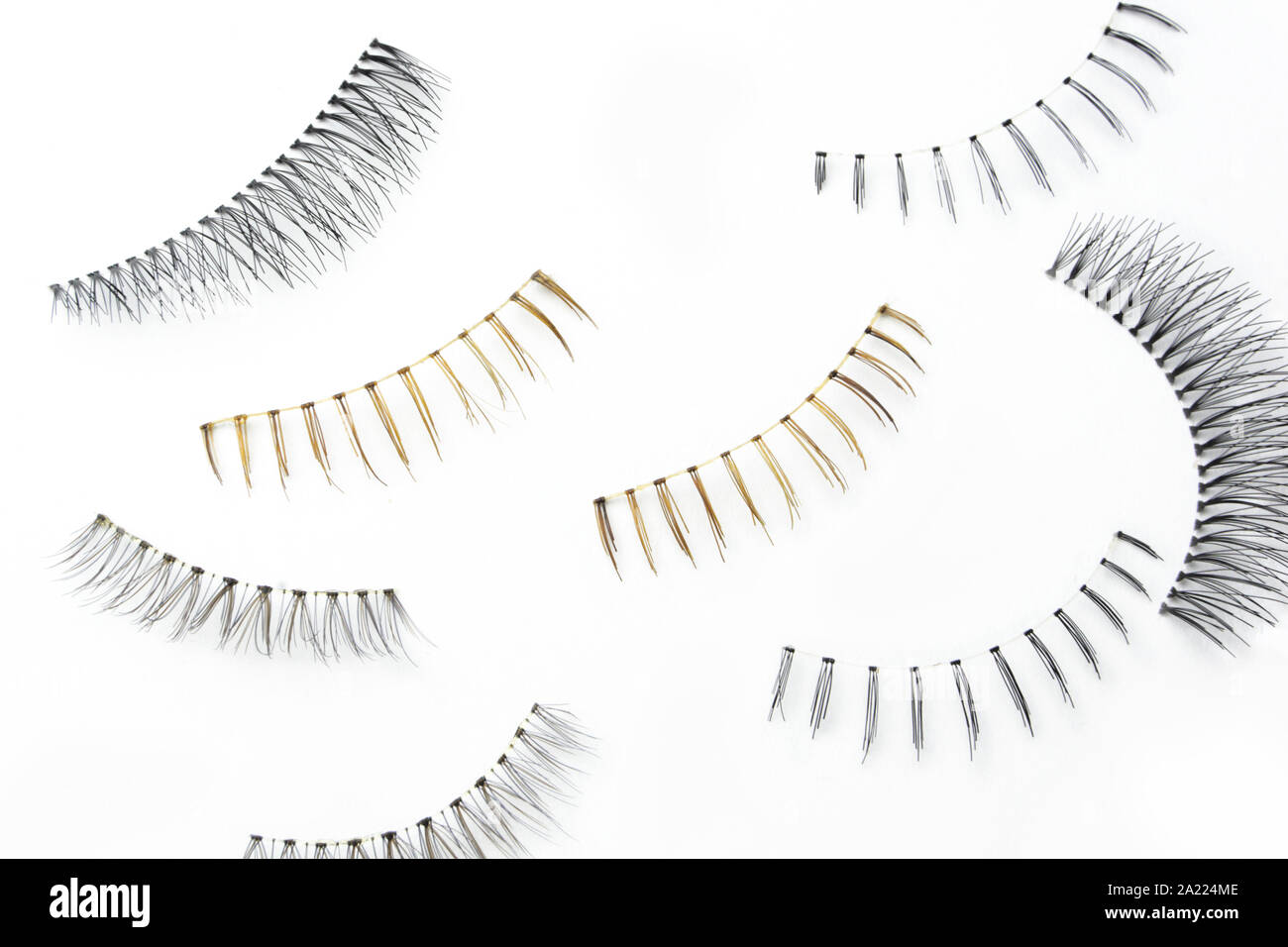 false eye lashes on white background Stock Photo - Alamy