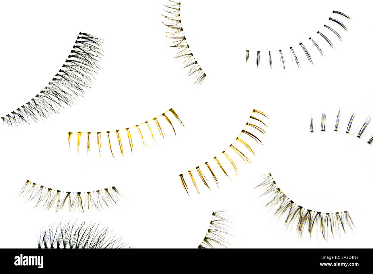 false eye lashes on white background Stock Photo - Alamy