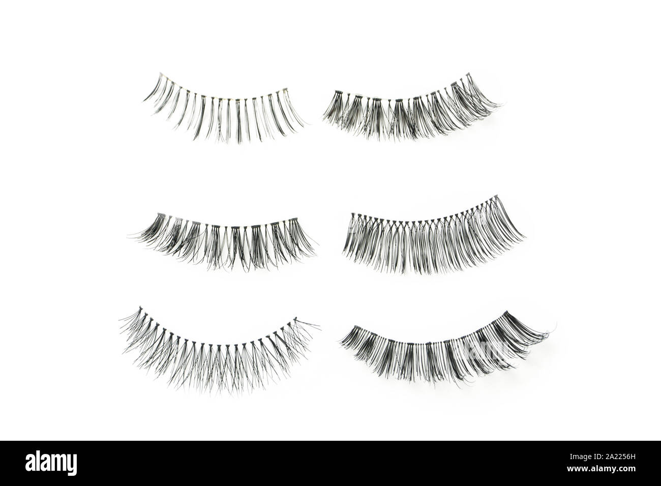 false eye lashes on white background Stock Photo - Alamy