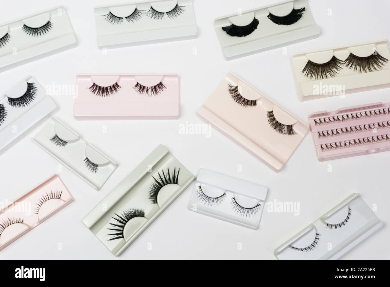 false eye lashes on white background Stock Photo - Alamy