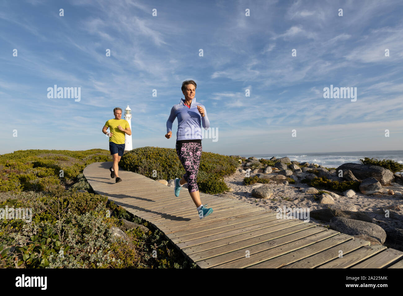 Running into the sea hi-res stock photography and images - Alamy
