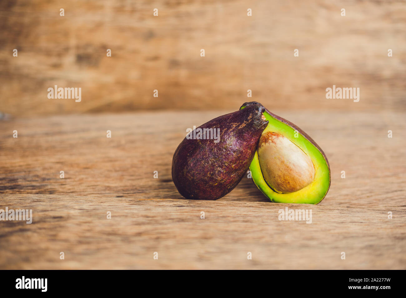 Side view half organic avocado hi-res stock photography and images - Alamy