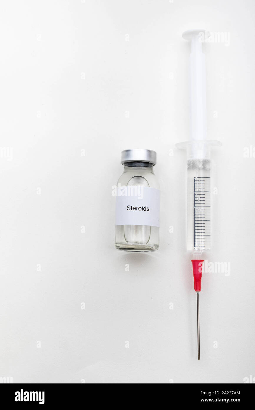 Medical concept showing medical a medical vial reading Steroids and a ...