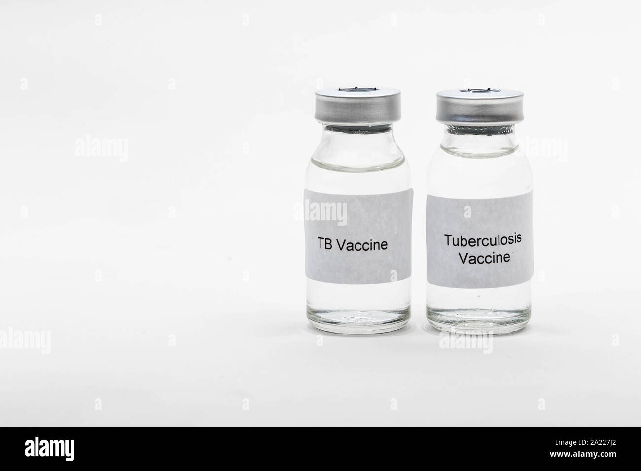Medical concept showing medical 2 medical vials reading TB Vaccine and ...