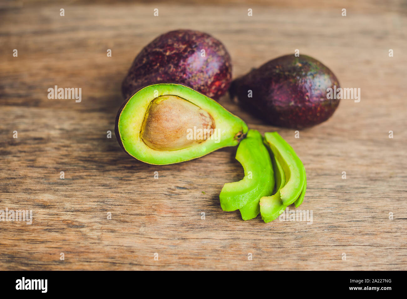 Side view half organic avocado hi-res stock photography and images - Alamy