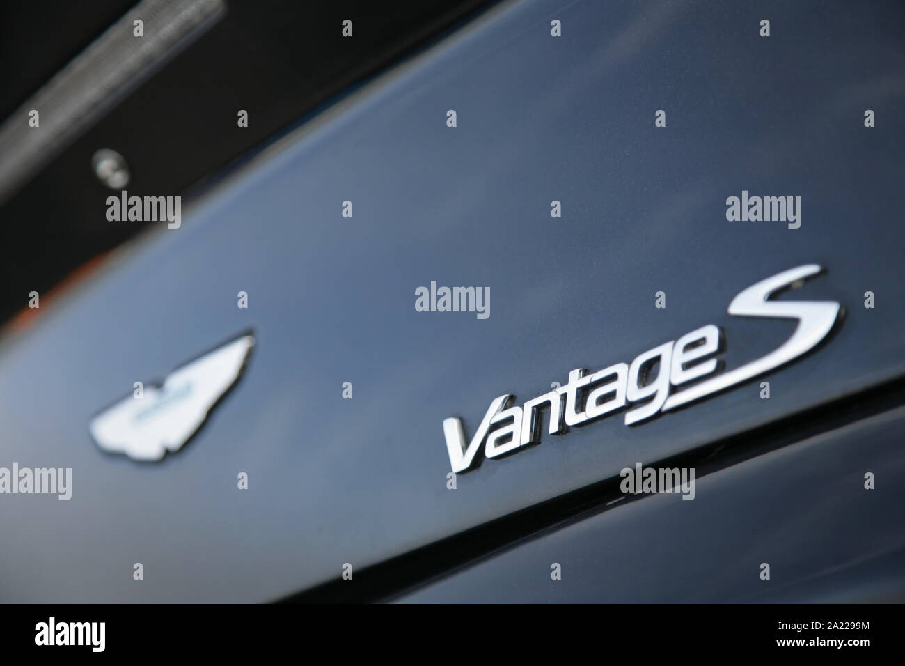 Badges on rear of Aston Martin Vantage S sportscar Stock Photo - Alamy