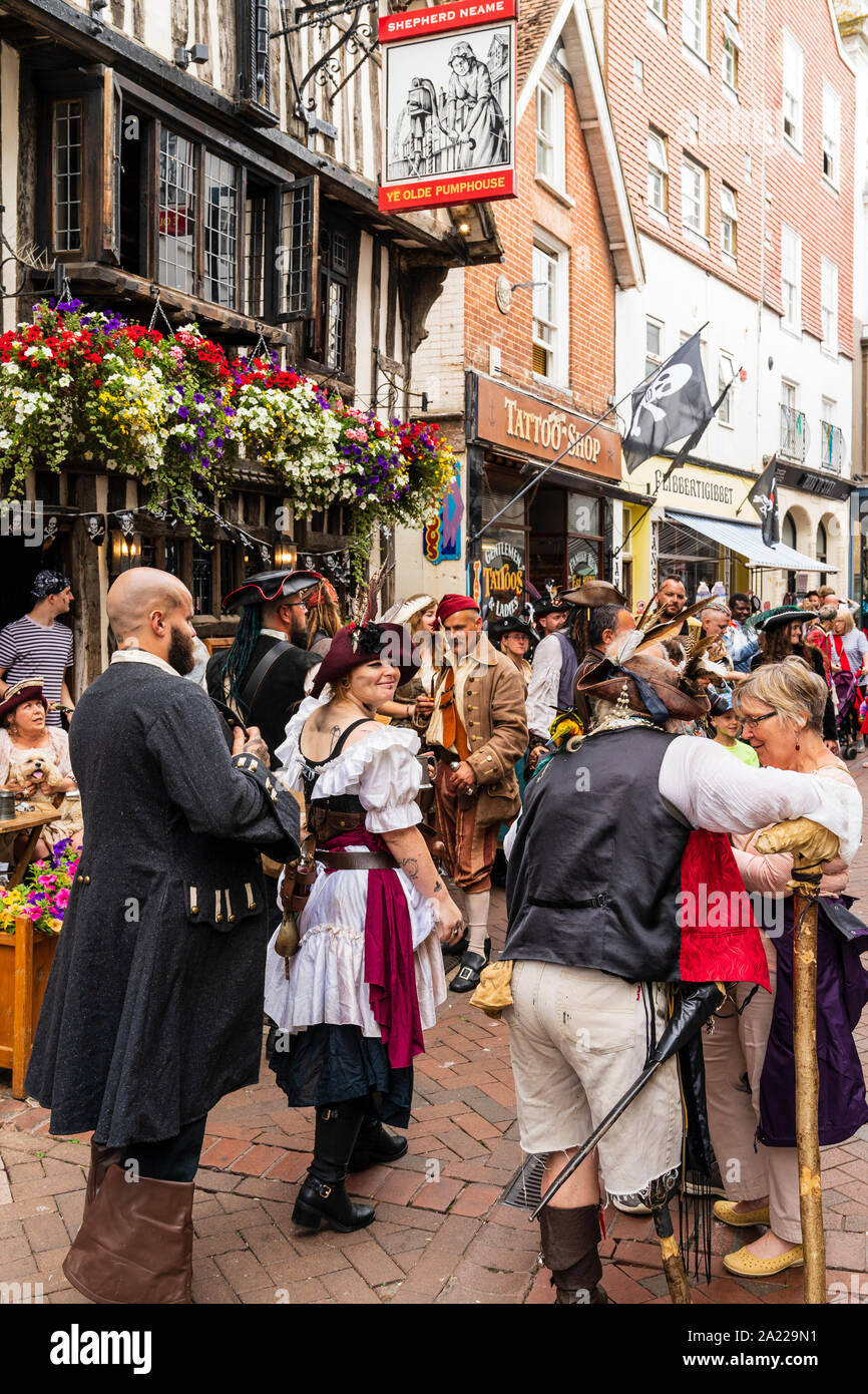 People dressed up as pirates gathering outside the Ye Olde Pumphouse ...