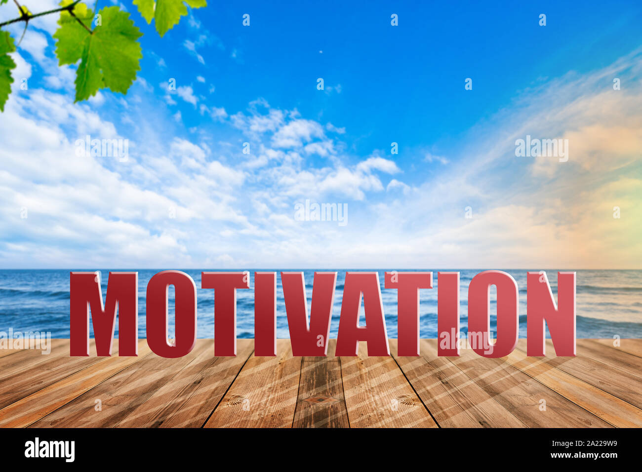 motivation sign wood floor sea background Stock Photo - Alamy