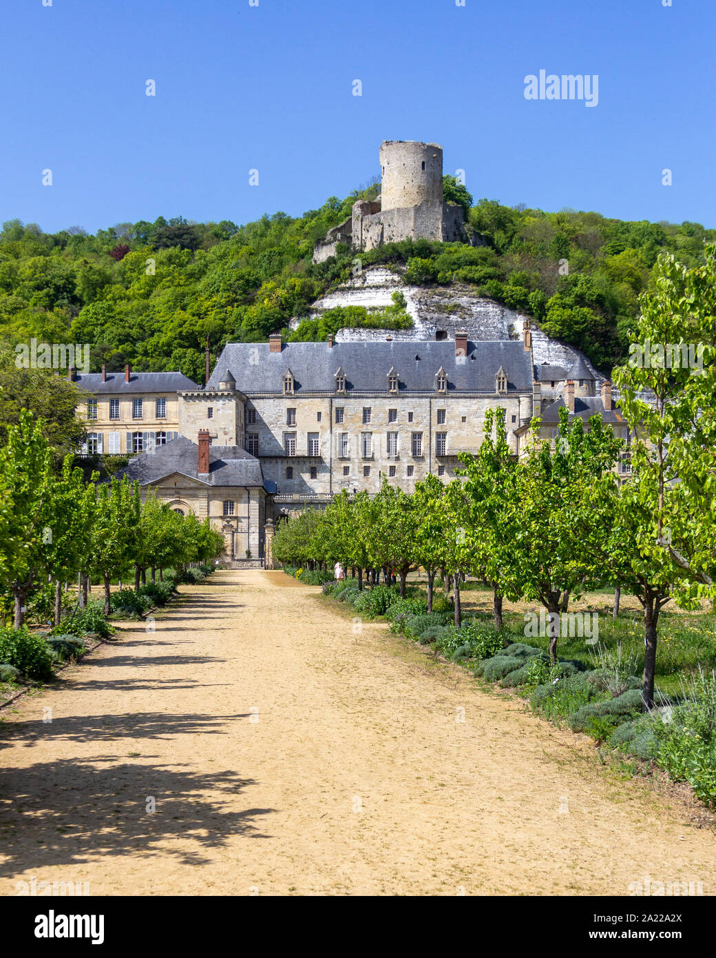 The tower of Chateau de La Roche-Guyon is perched atop the hill above ...