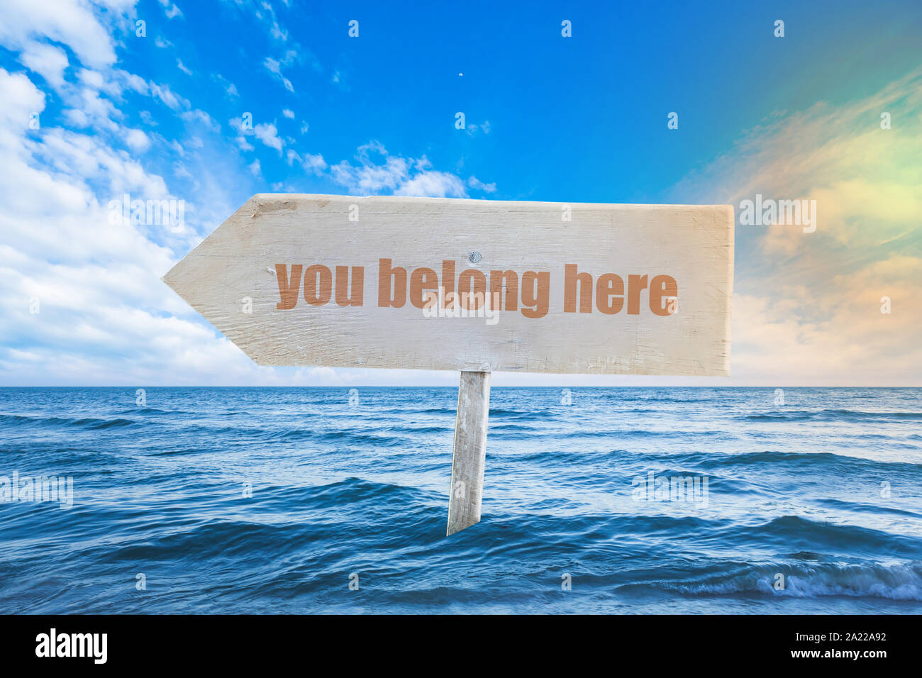 you belong here sign Stock Photo - Alamy