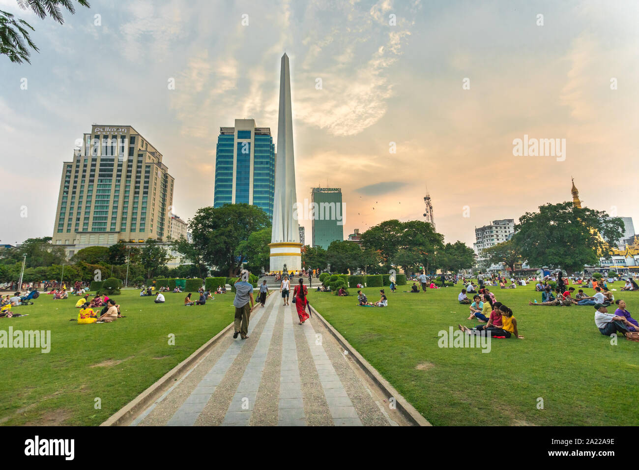 Burmese independence monument and skyscrapers hi-res stock photography ...