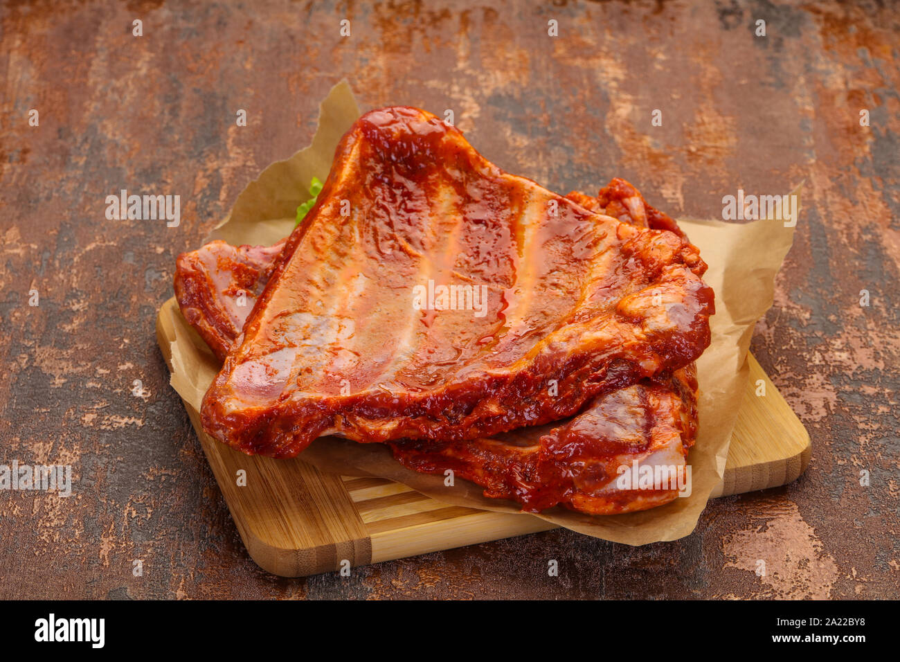 Raw marinated pork ribs ready for cooking Stock Photo - Alamy