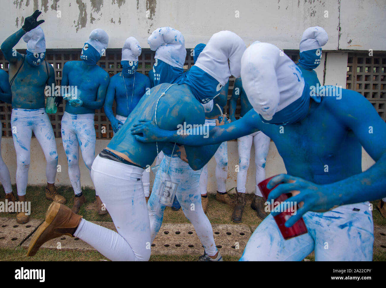 Revelers with Smurfs costume dancing, drinking and cheering Stock Photo ...
