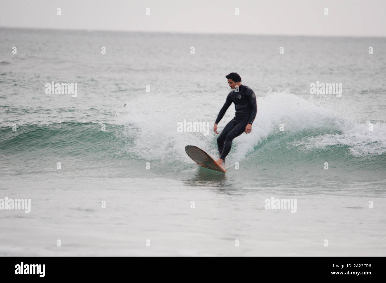 Surfers in cornwall Stock Photo - Alamy