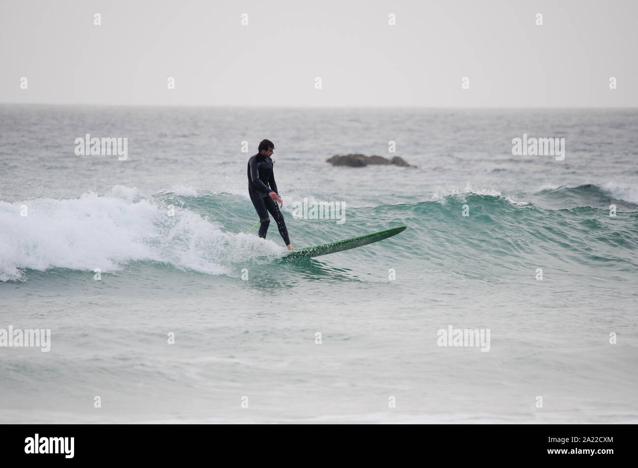 Surfers in cornwall Stock Photo - Alamy