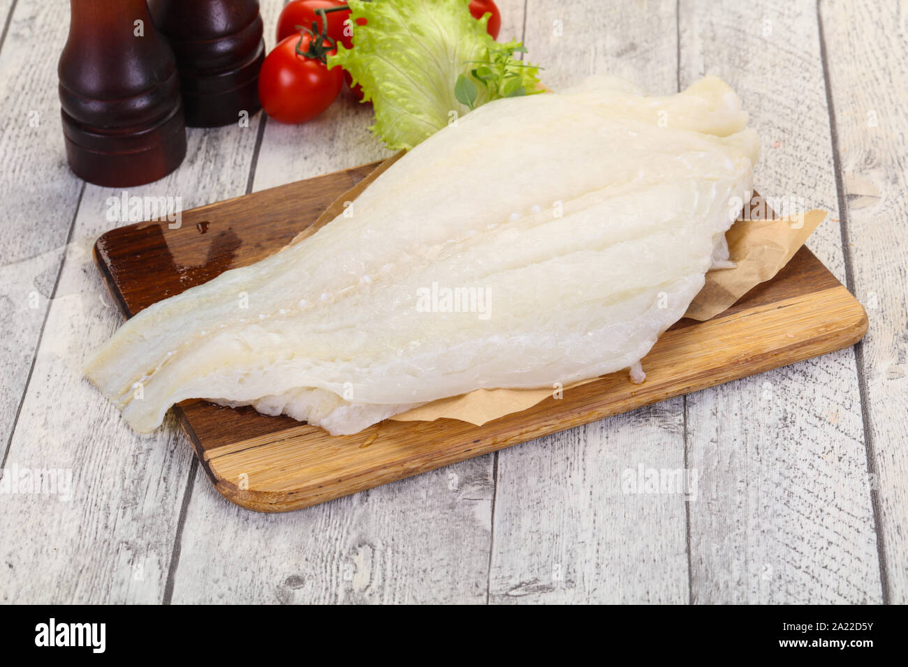 Raw halibut fillet ready for cooking Stock Photo - Alamy
