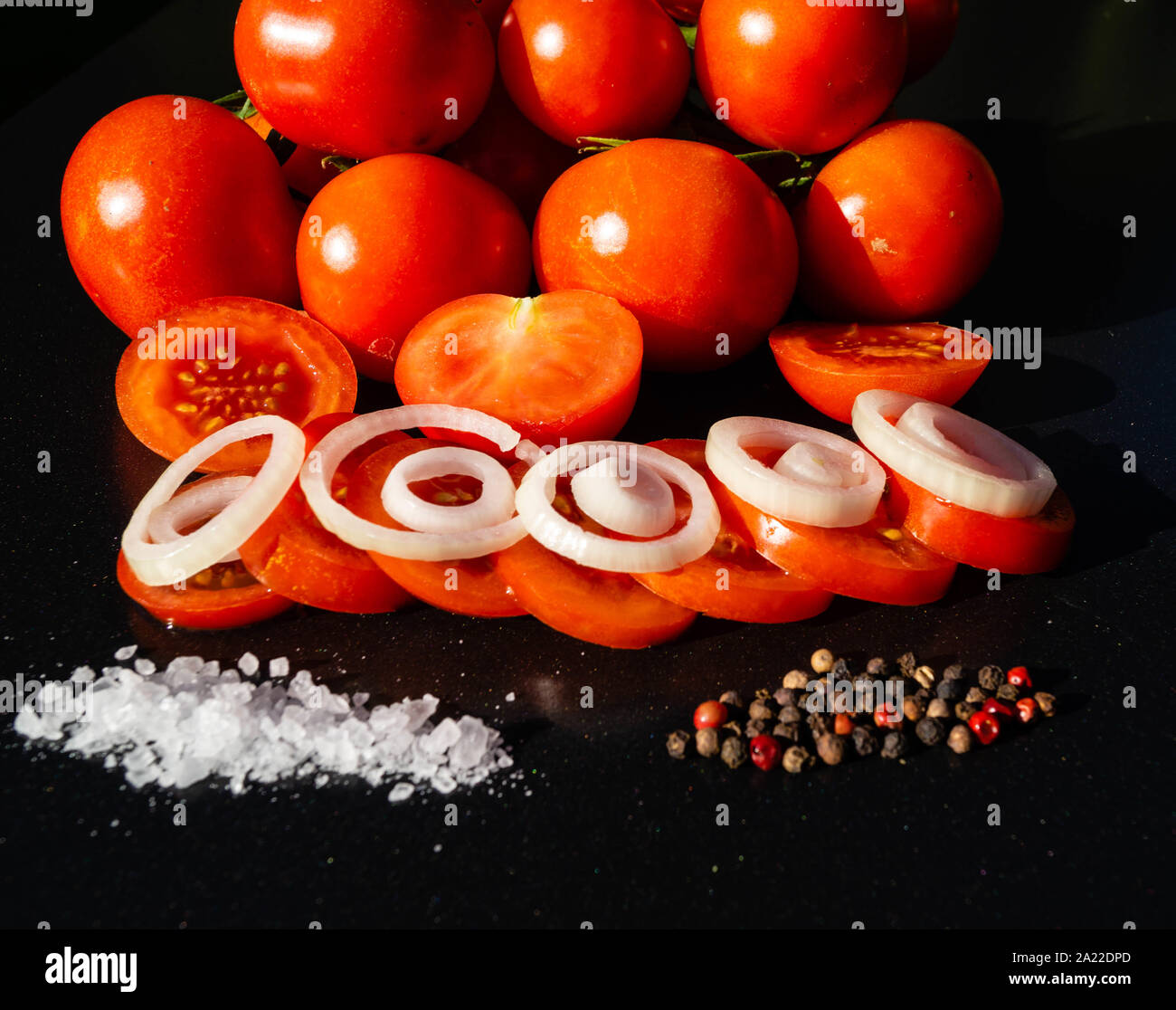 round red Tomato Solanum lycopersicum for a salad Stock Photo - Alamy
