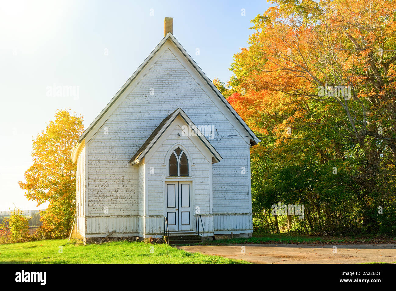 Fall foliage around a small abandoned church Stock Photo - Alamy