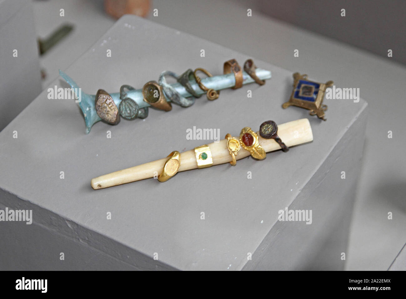 Collection of precious metals rings displayed on rods, National ...