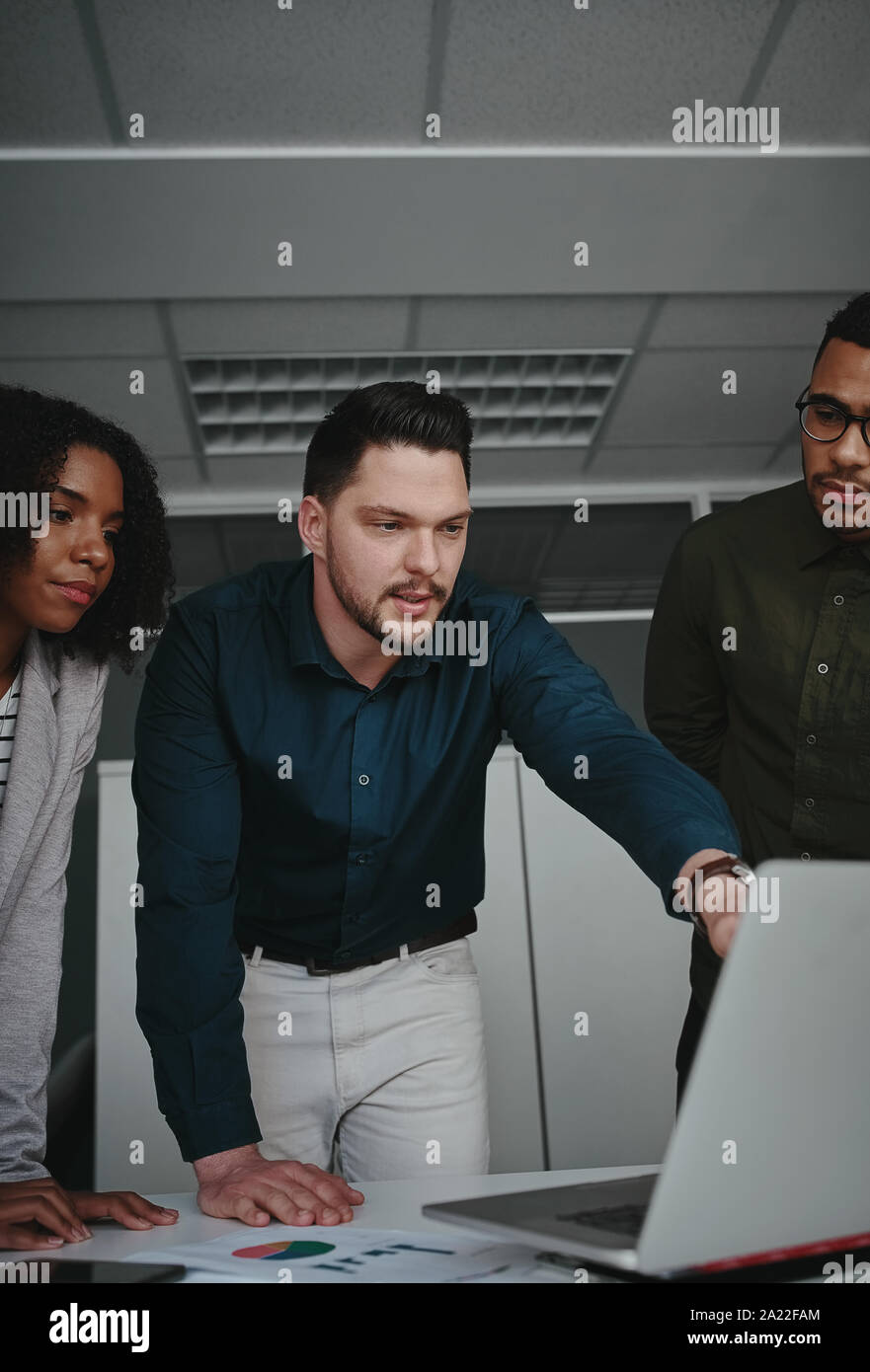 Helpful handsome male manager explaining new online project to diverse ...