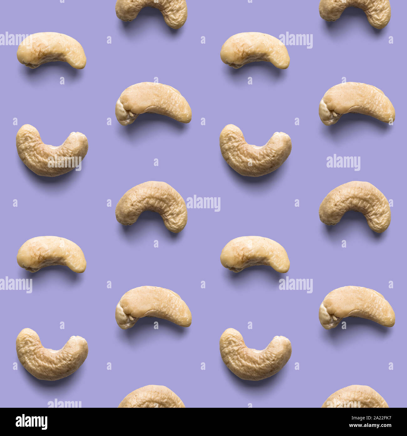 Nuts on colour background. Seamless texture Stock Photo - Alamy