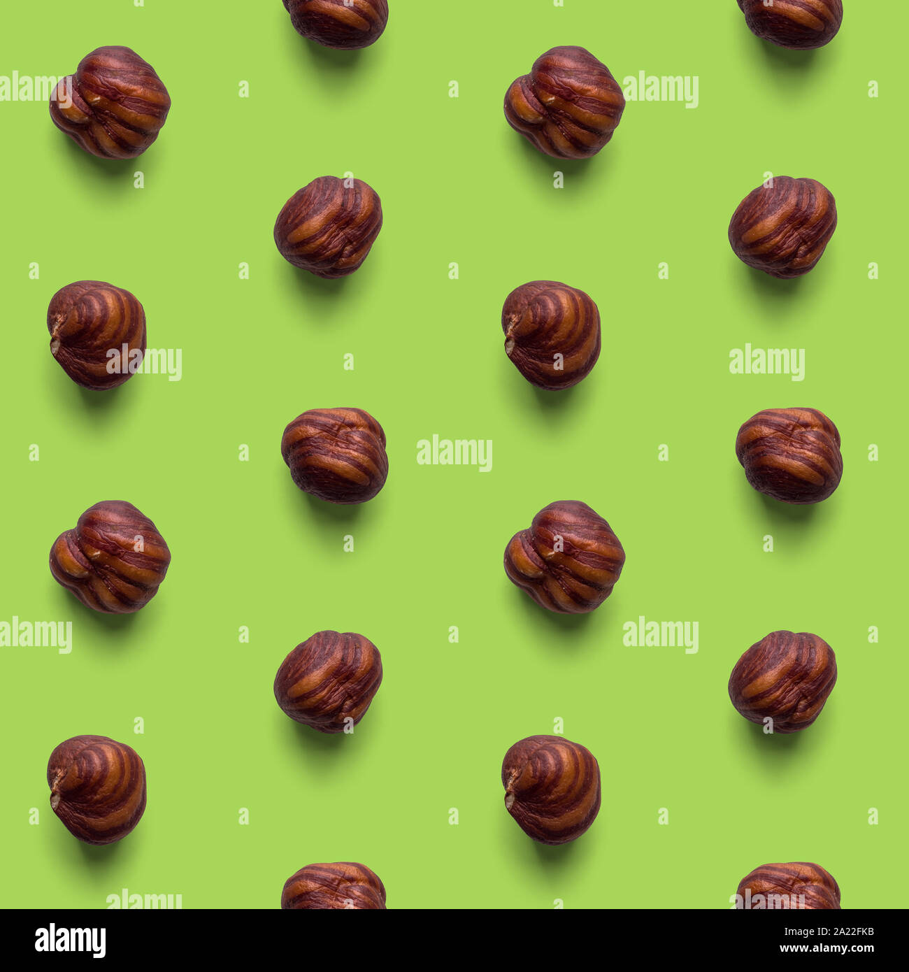 Nuts on colour background. Seamless texture Stock Photo - Alamy