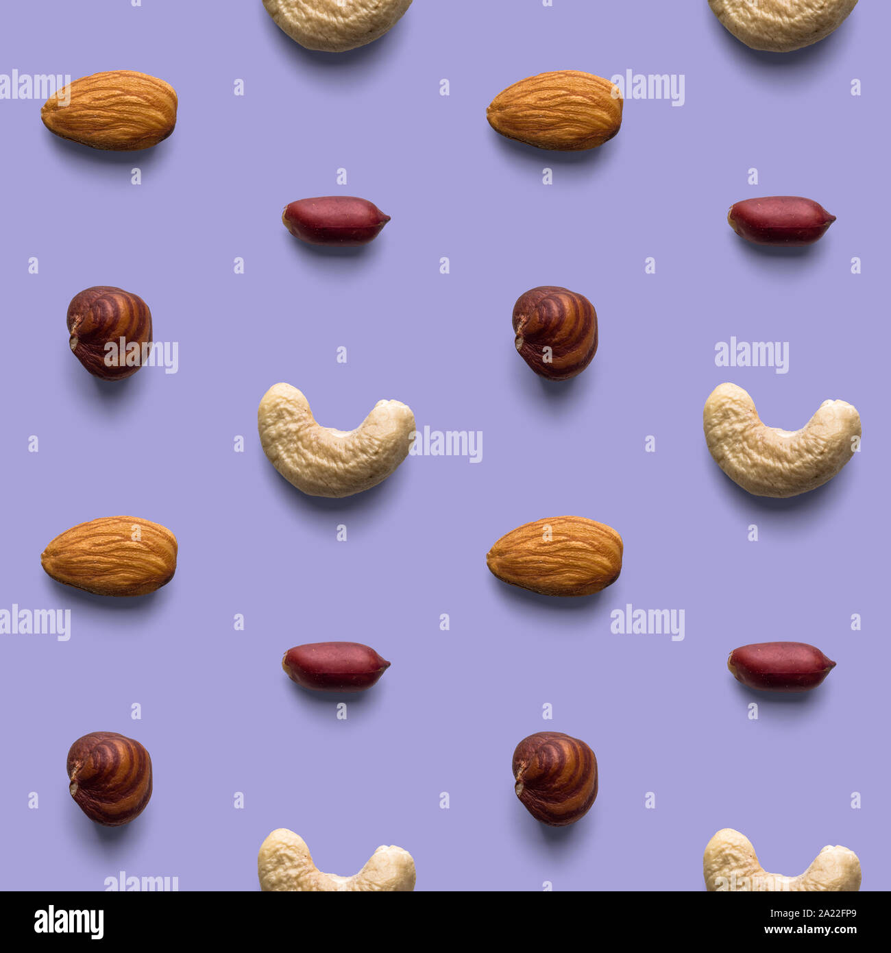 Mixture of nuts on colour background. Seamless texture Stock Photo - Alamy