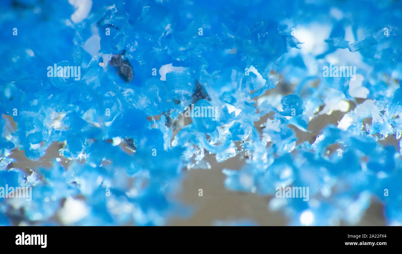 Microparticles of plastic in aquatic environment. Macro shooting of ...