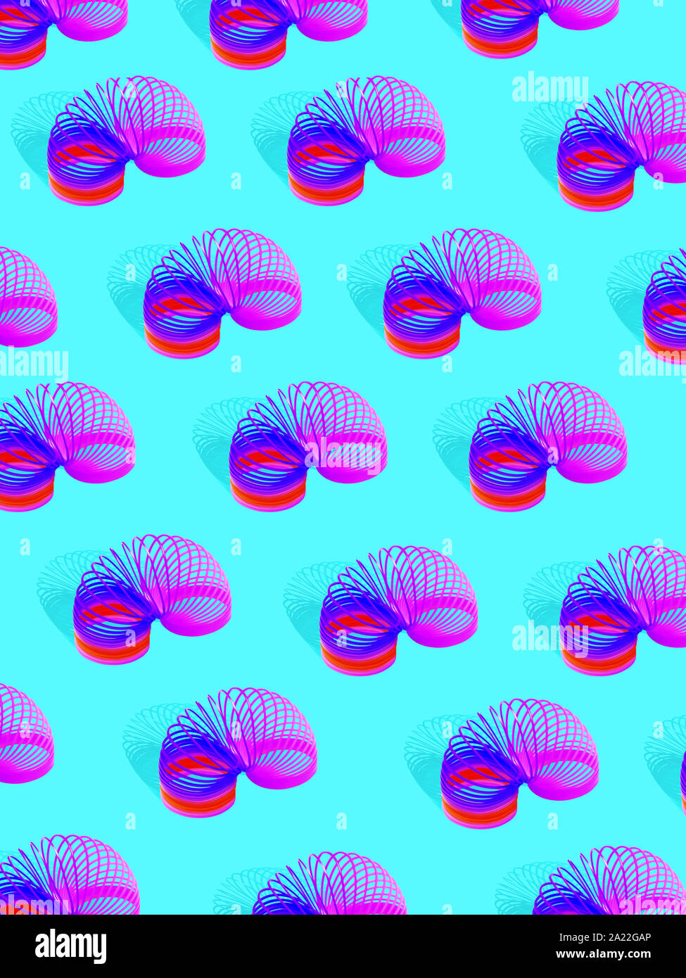 Slinky toy pattern Many spring toys are standing in rows on a blue ...