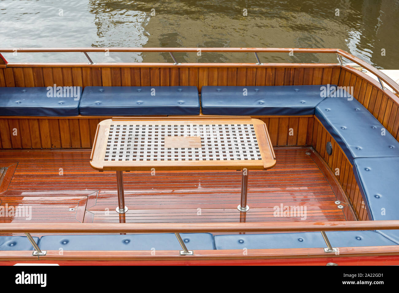 Desk and Bench Seats at Wooden Boat Deck Stock Photo - Alamy
