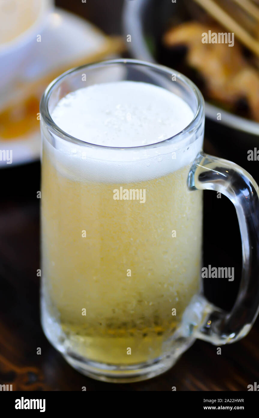 beer, a glass of beer with beer foam Stock Photo - Alamy