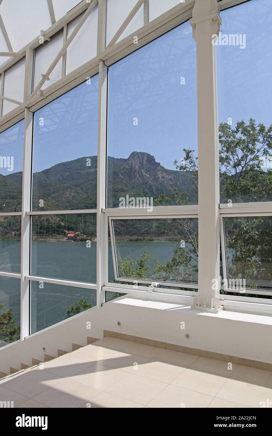 White steel framed glass with view of Danube River and Svinita Romanian ...