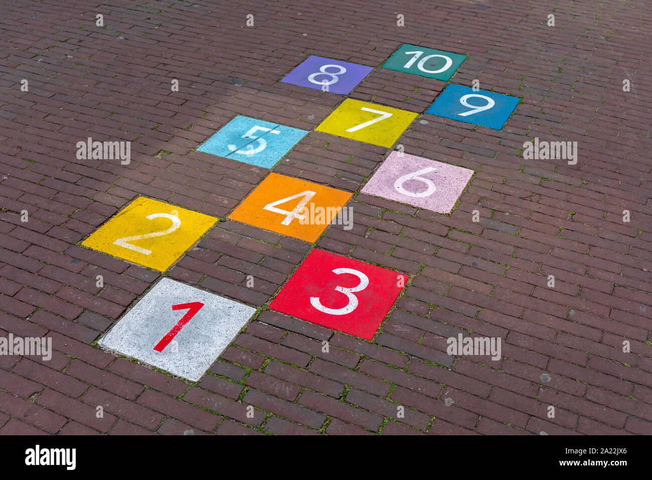 Colourful Hopscotch Playground Markings Numbers at Pavement Stock Photo ...