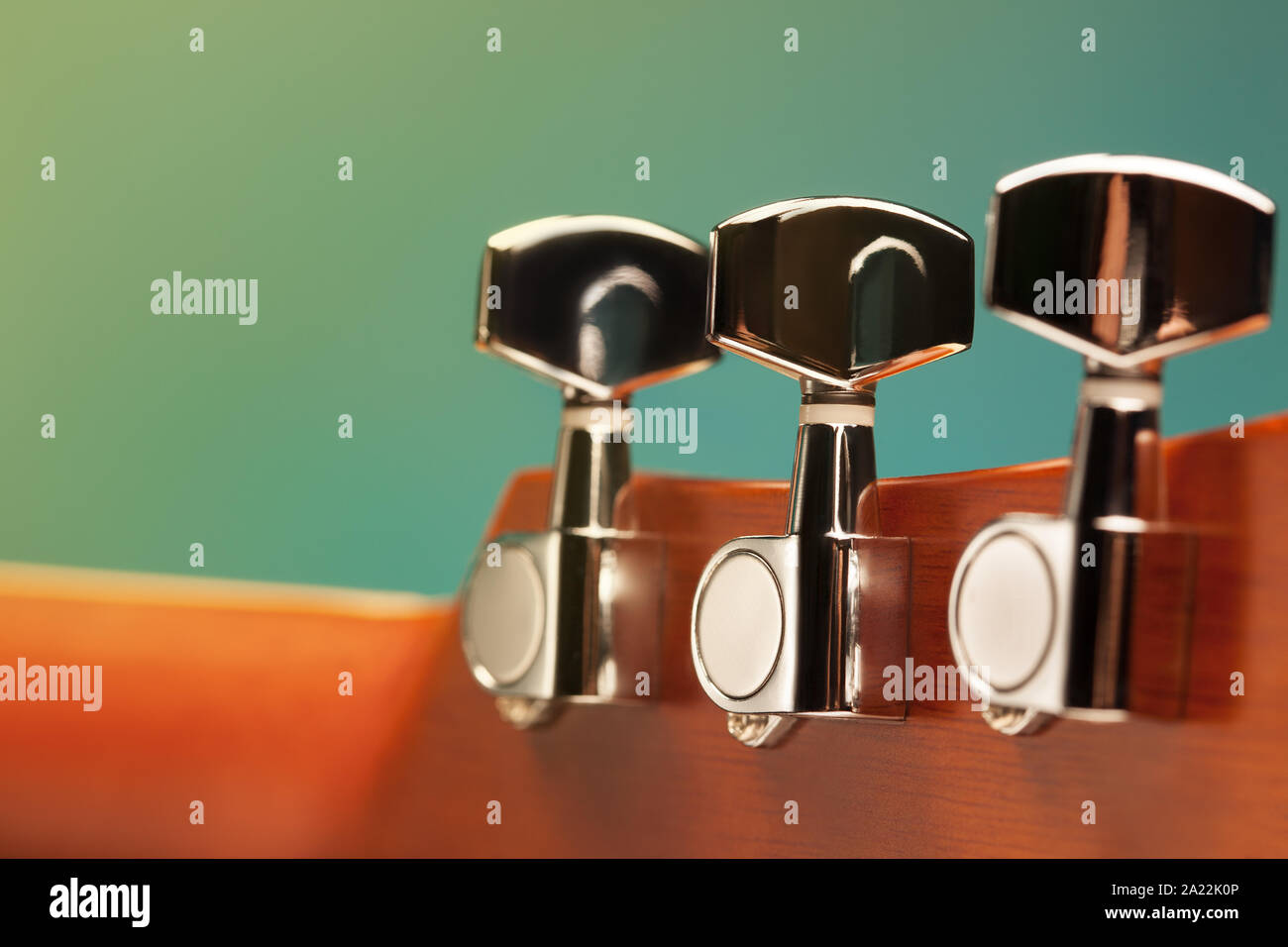 Acoustic guitar details. Guitar neck backside, tuning pegs Stock Photo ...