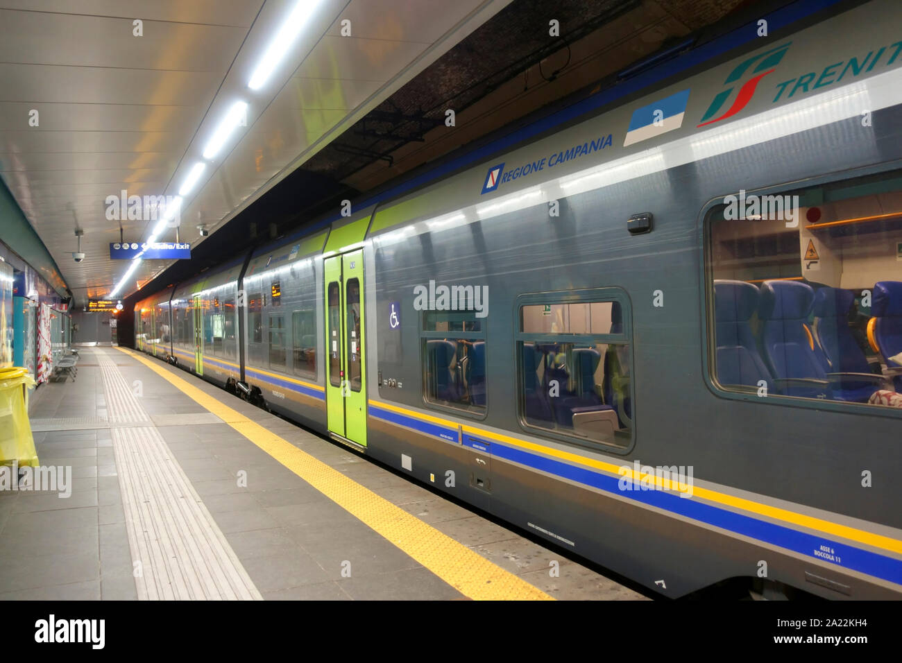 Naples Metro underground station with train leaving platform, Italy ...