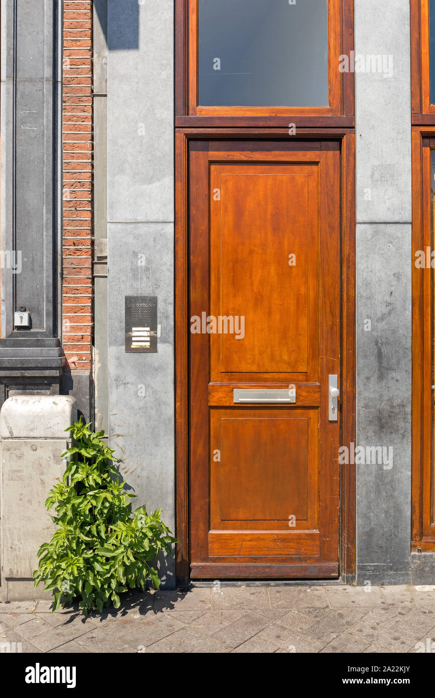 Narrow Wooden Door Home Entrance in Amsterdam Stock Photo - Alamy