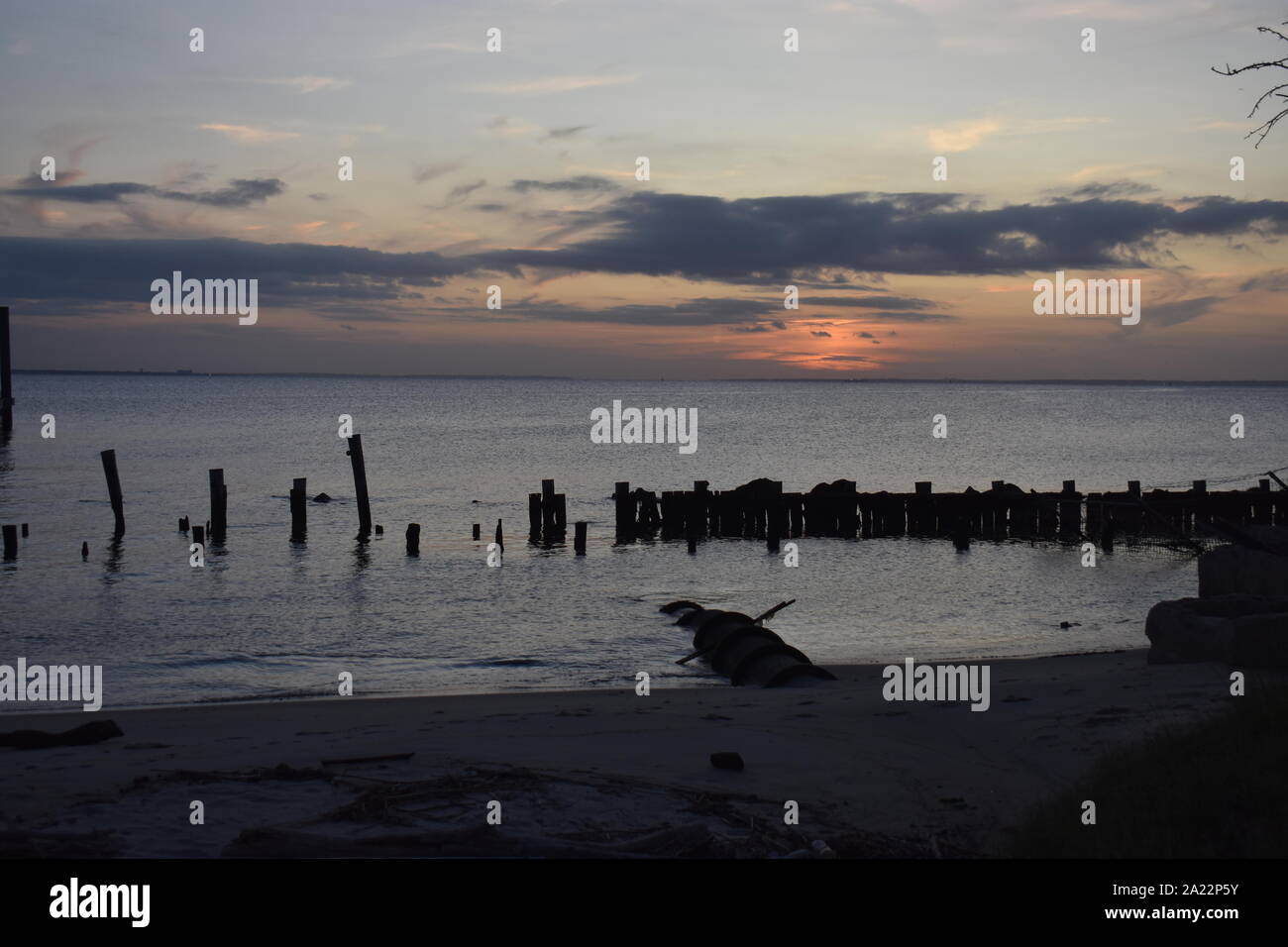 Colorful sunset overlooking the Sandy Hook Bay from Sandy Hook ...