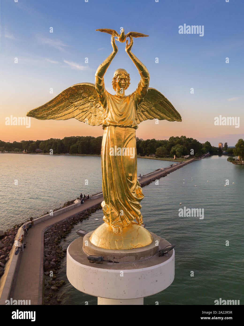 Blessed virgin angel statue in the siofok harbor. Beautiful morning ...