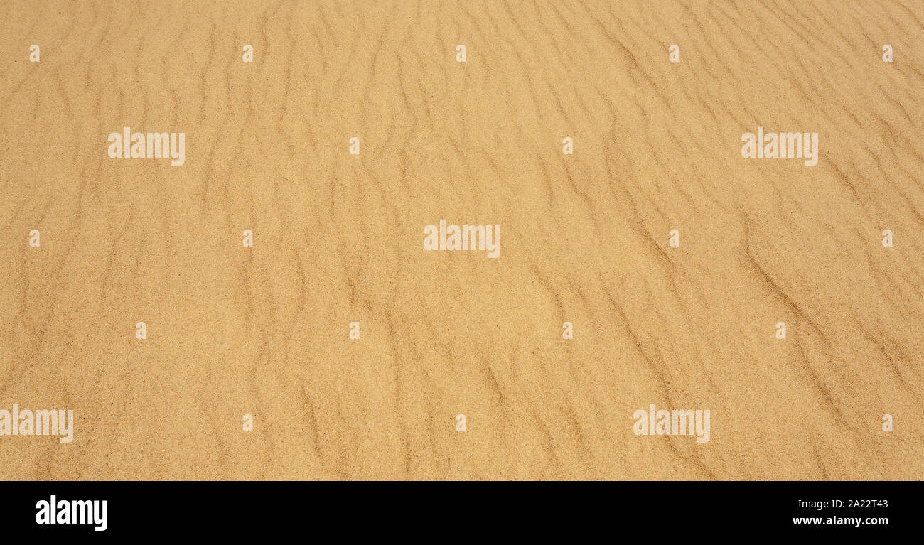 Yellow sand texture for background Stock Photo - Alamy
