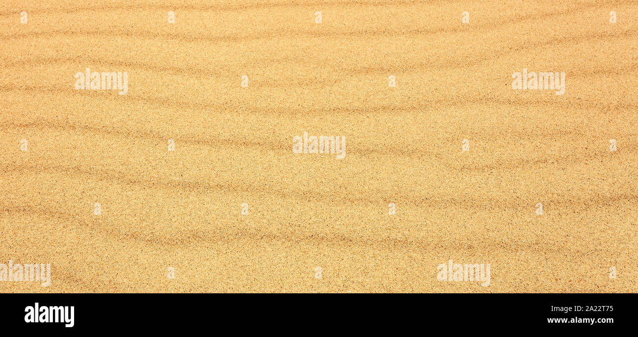 Yellow sand texture for background Stock Photo - Alamy