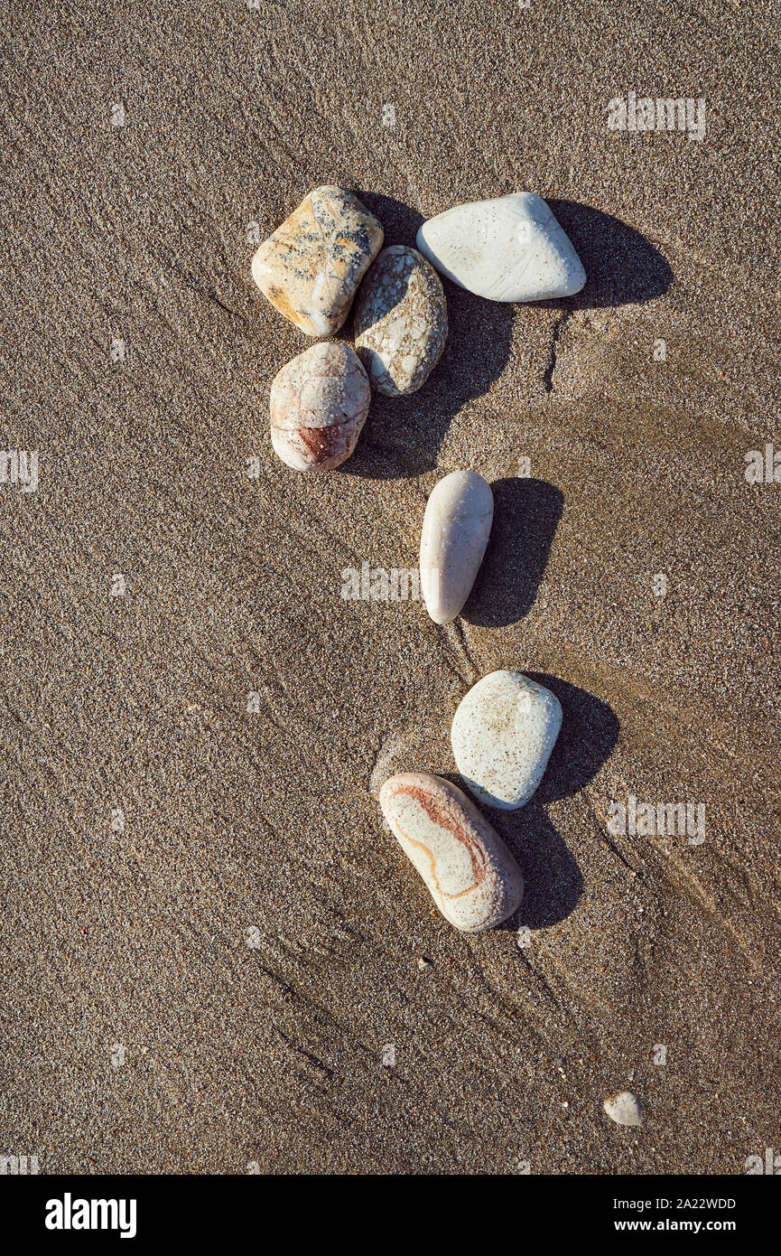 Pebbles on the beach on the Greek island of Corfu Stock Photo - Alamy