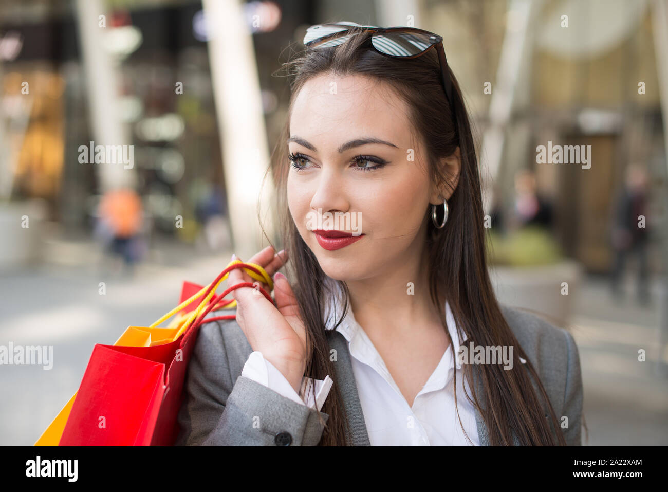 Business woman shopping after work Stock Photo - Alamy