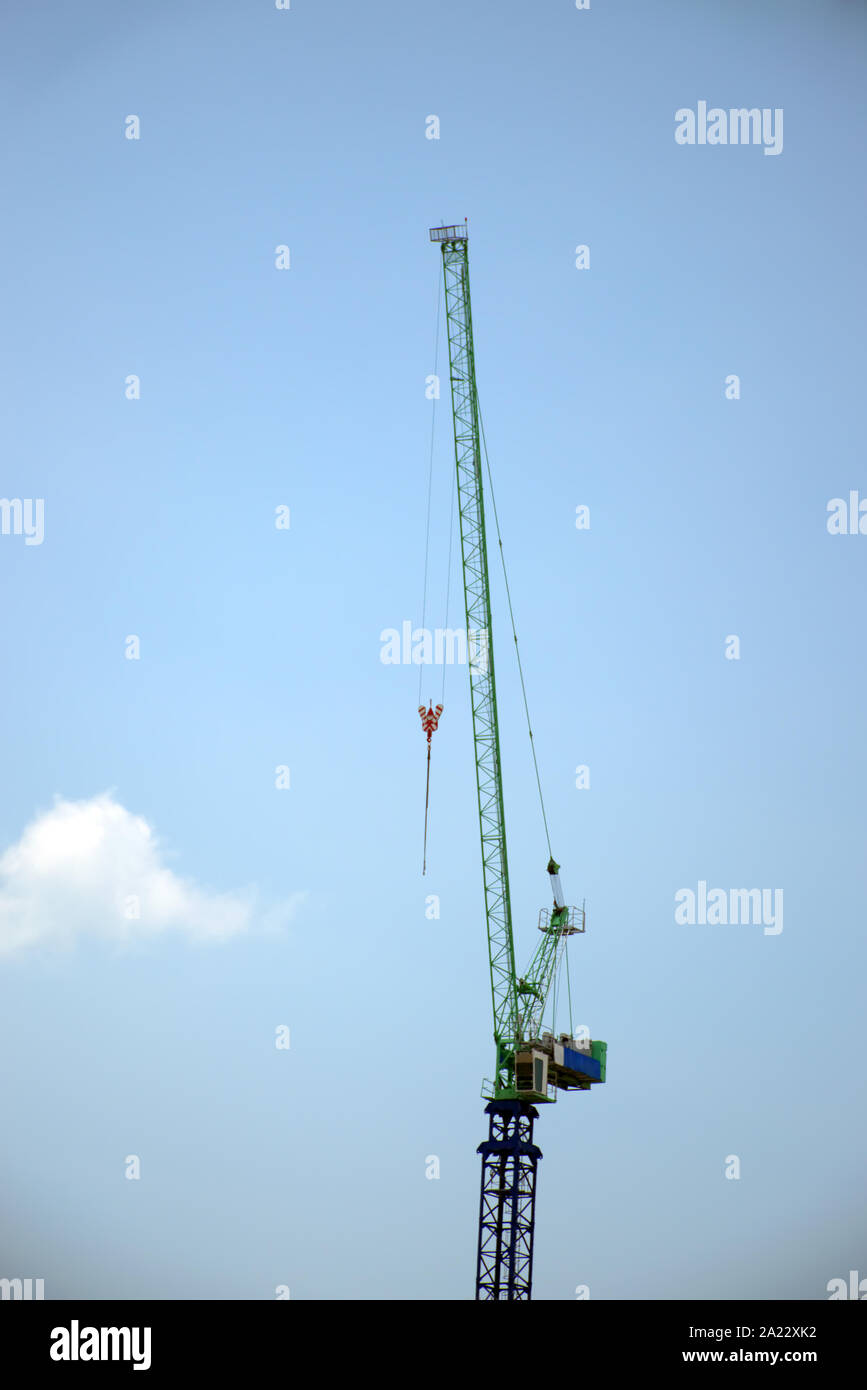 Modern lifting cranes build house hi-res stock photography and images ...